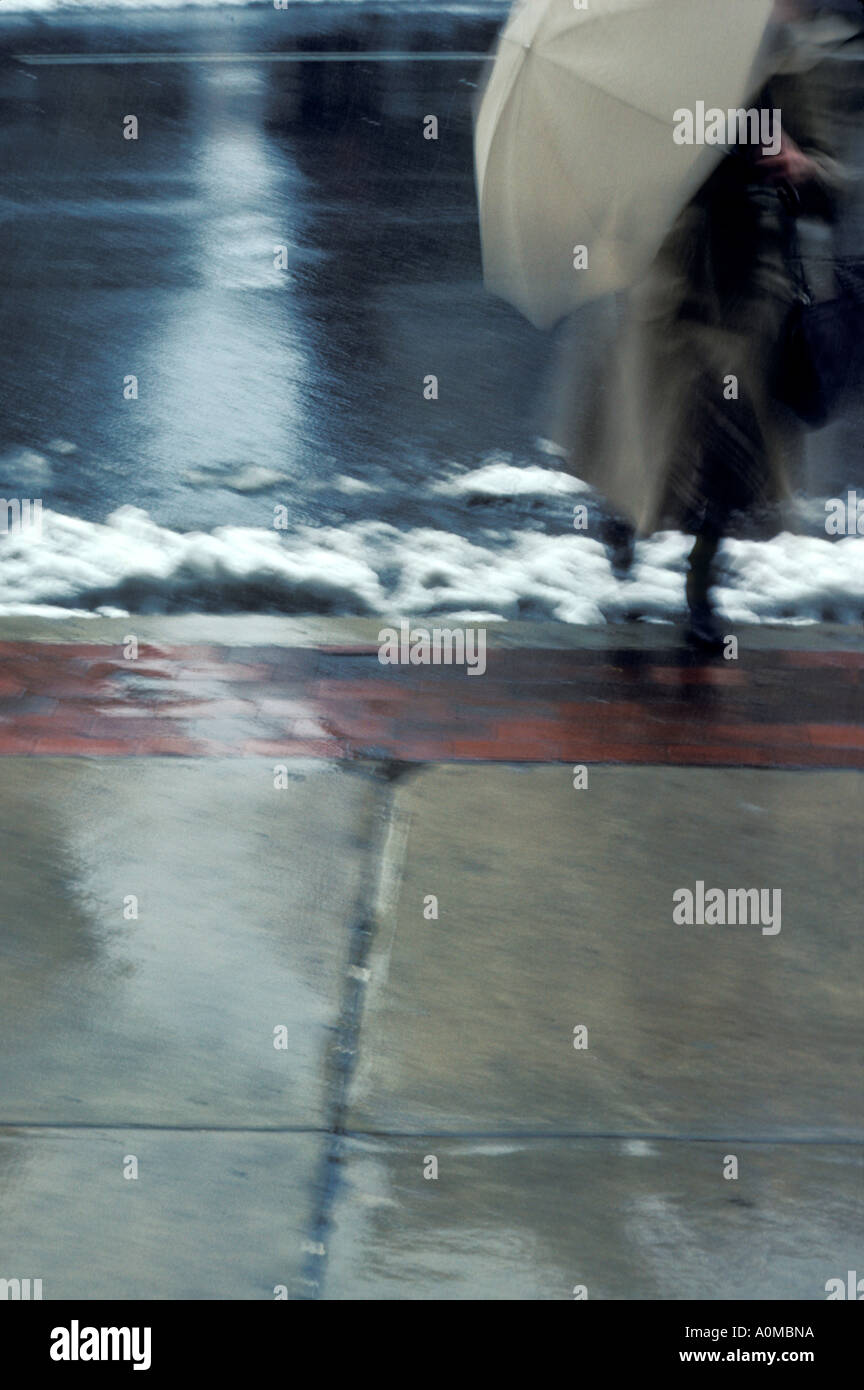 movement rain rainy day snow slush slushy street crossing umbrella ...