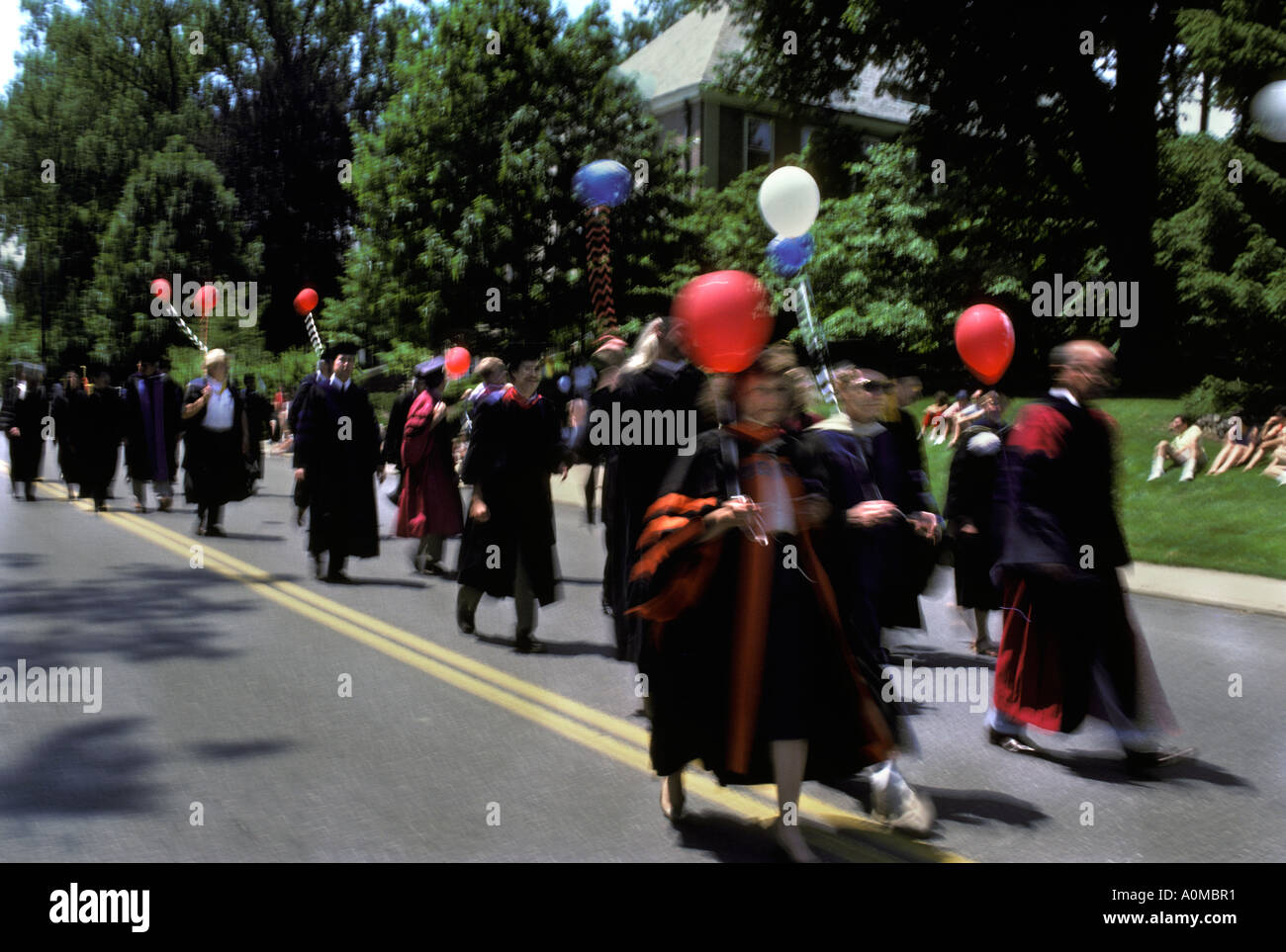 community day parade cap and gown movement motion blur ballons Stock ...