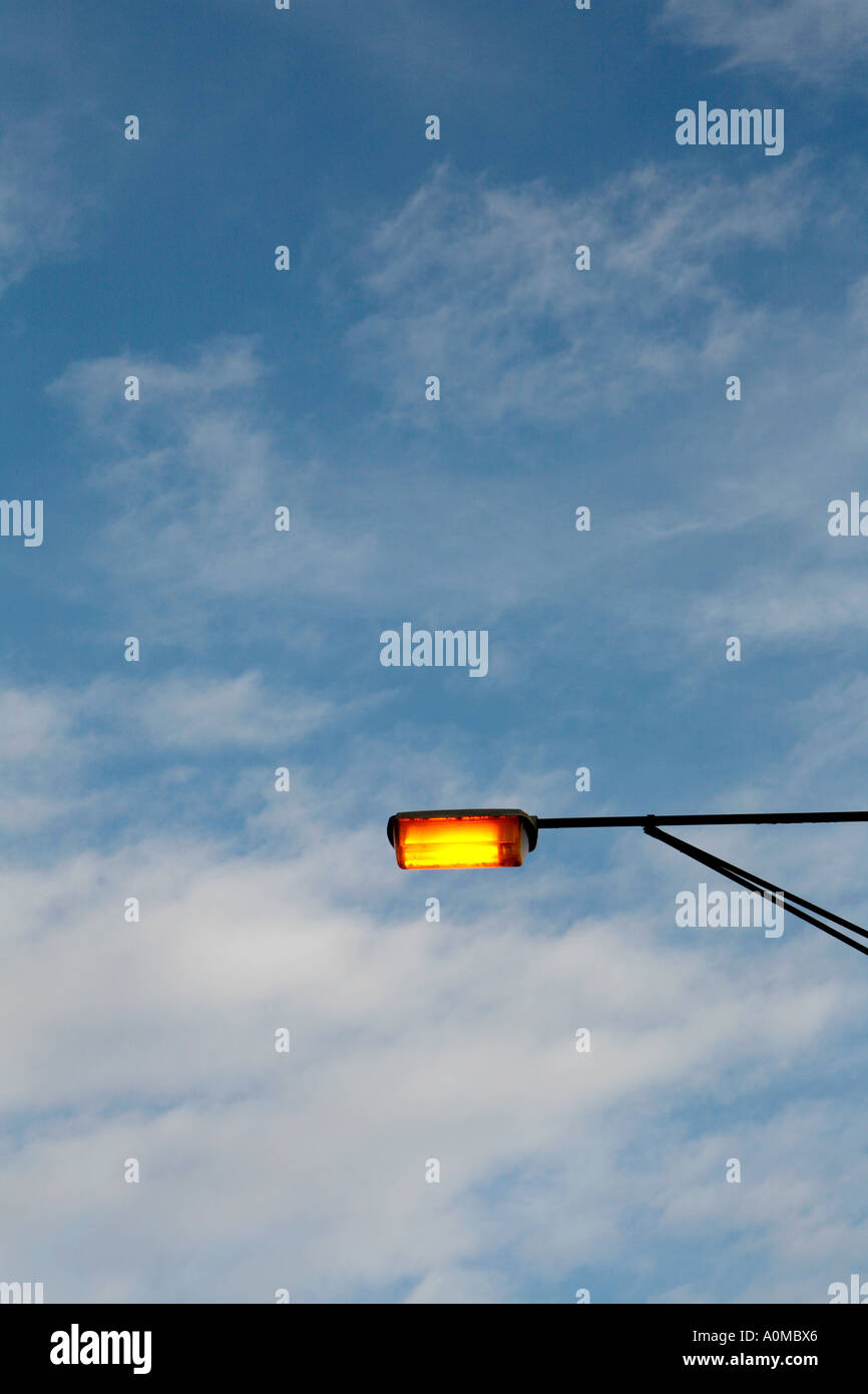 Single lit street lamp Stock Photo - Alamy