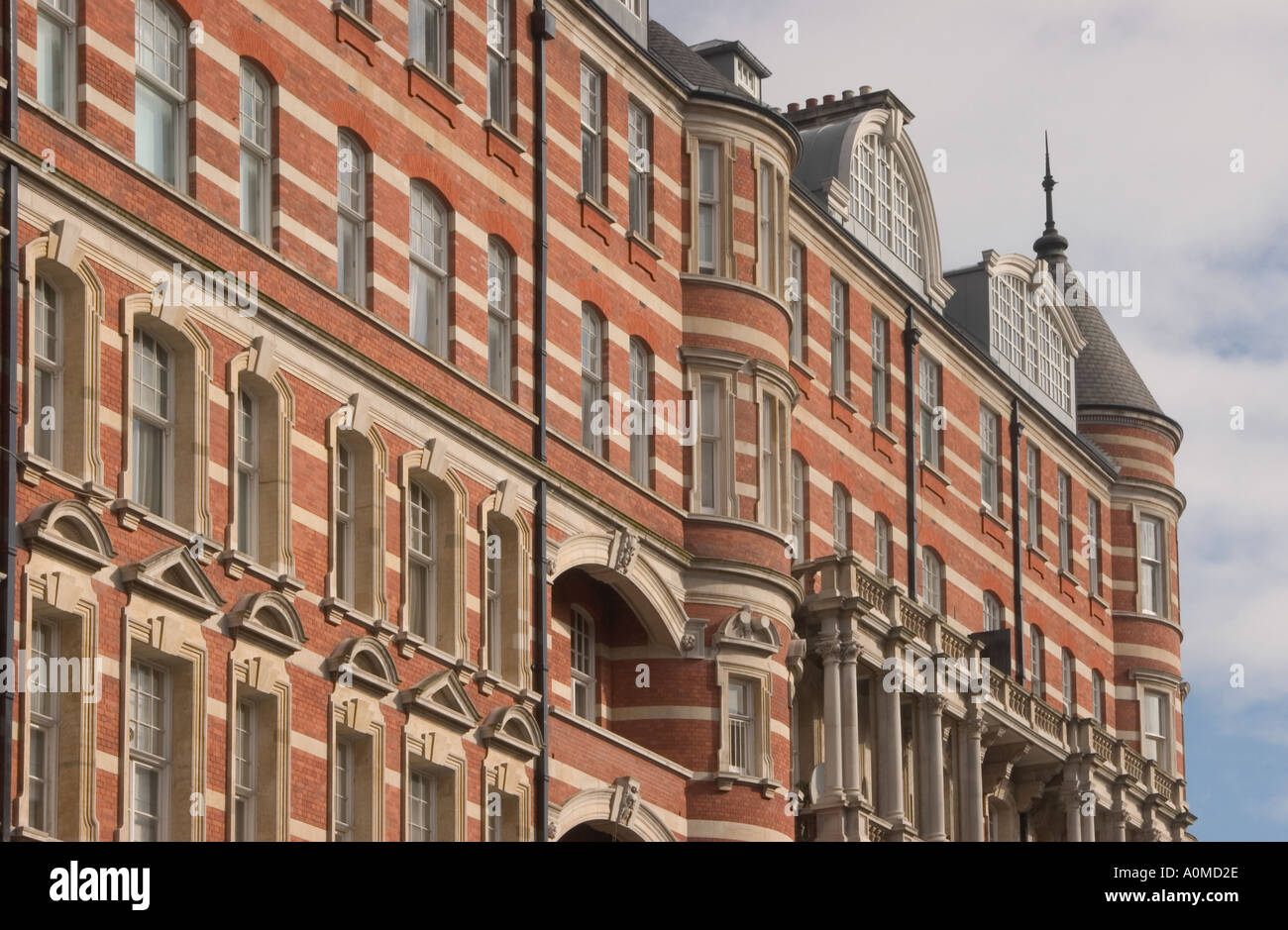 A big red and yellow brick building in London on a sunny day Stock ...