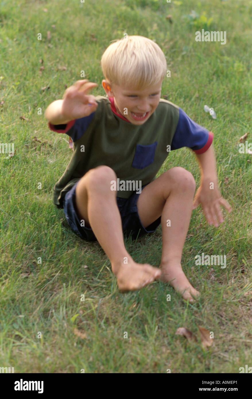 1 one young barefoot boy green grass happy frolic frolicing concept ...