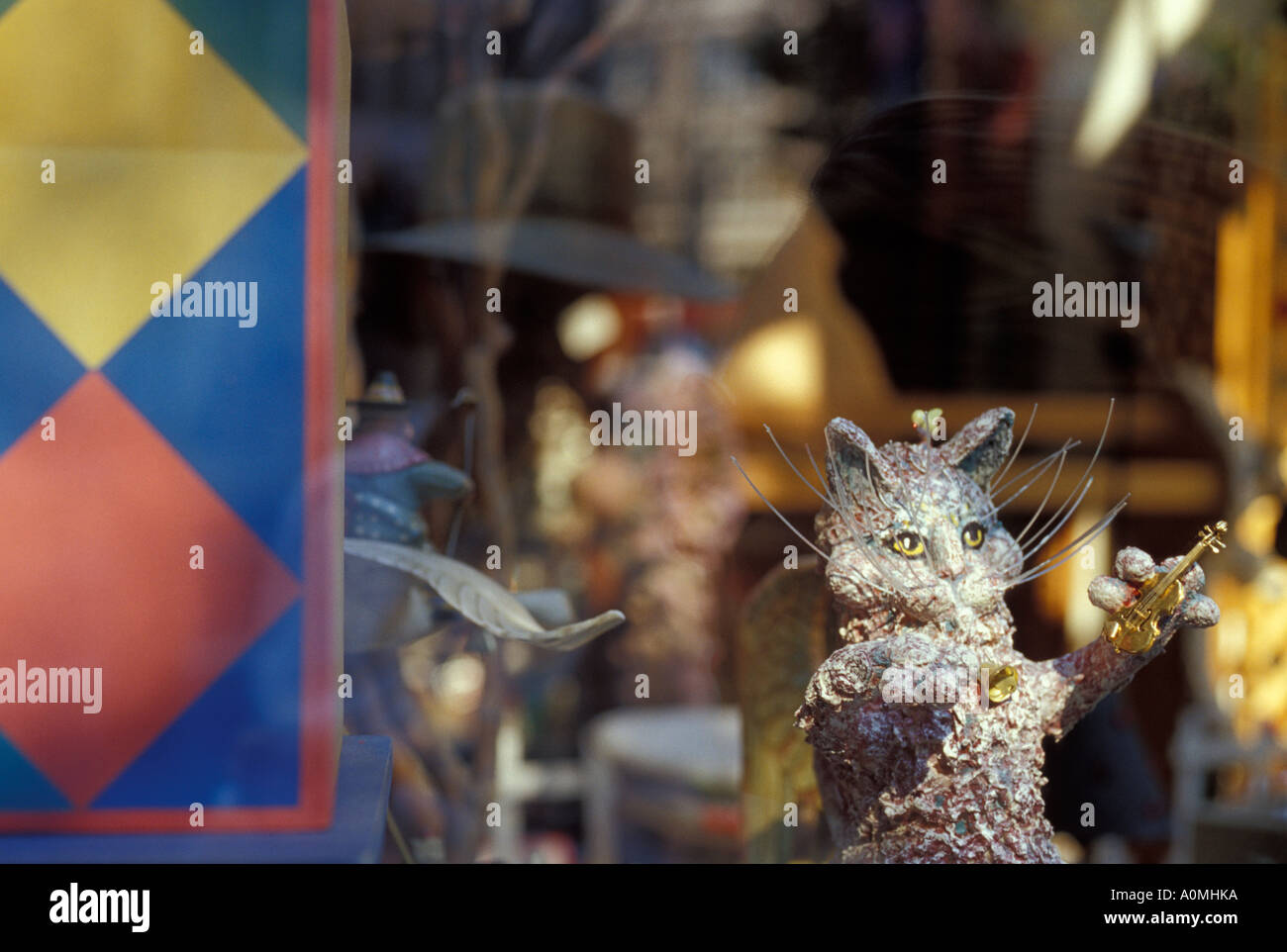 store window trinkets cat garage sale flea market Stock Photo - Alamy