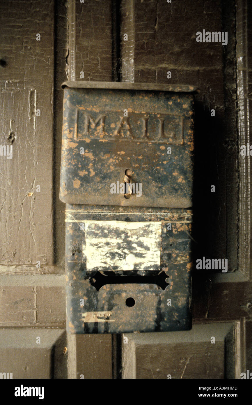 close up detail worn dilapidated metal mail box rust weather weathered ...