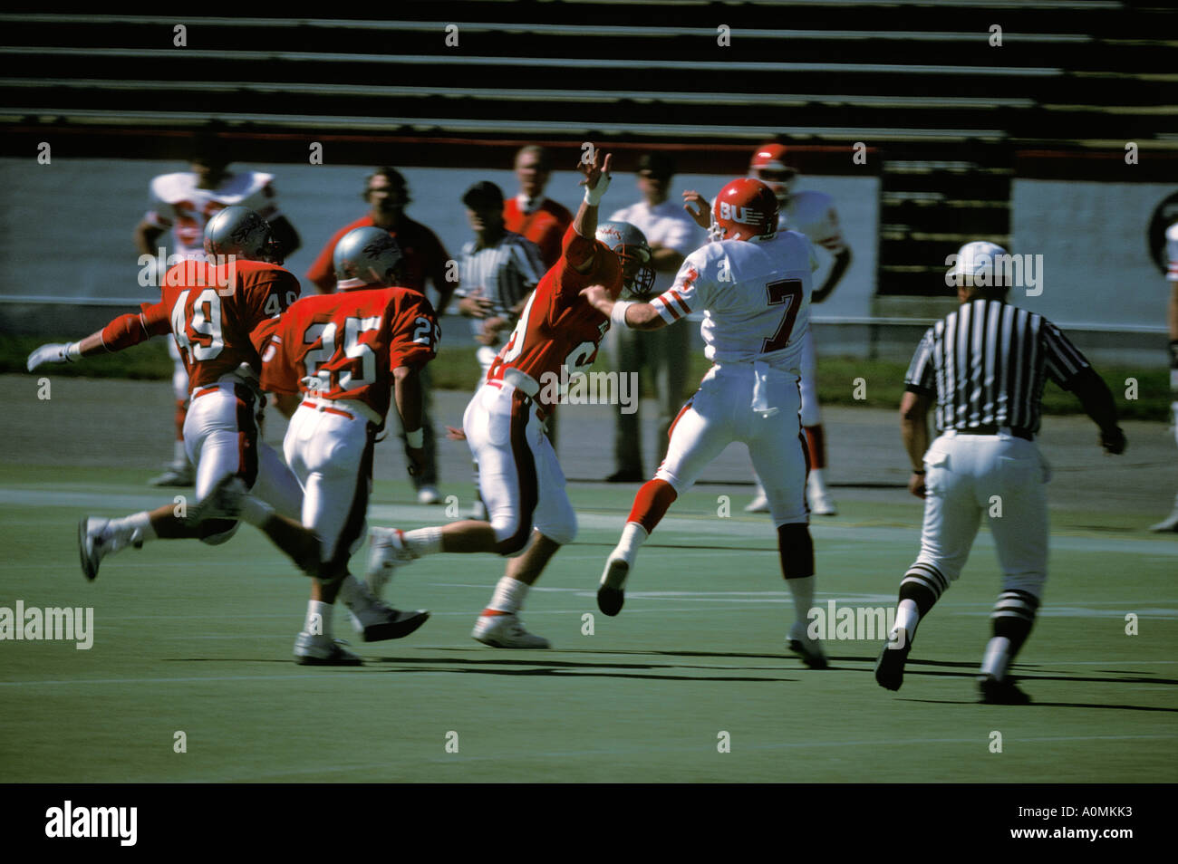 college football lineman referee officials game Stock Photo - Alamy