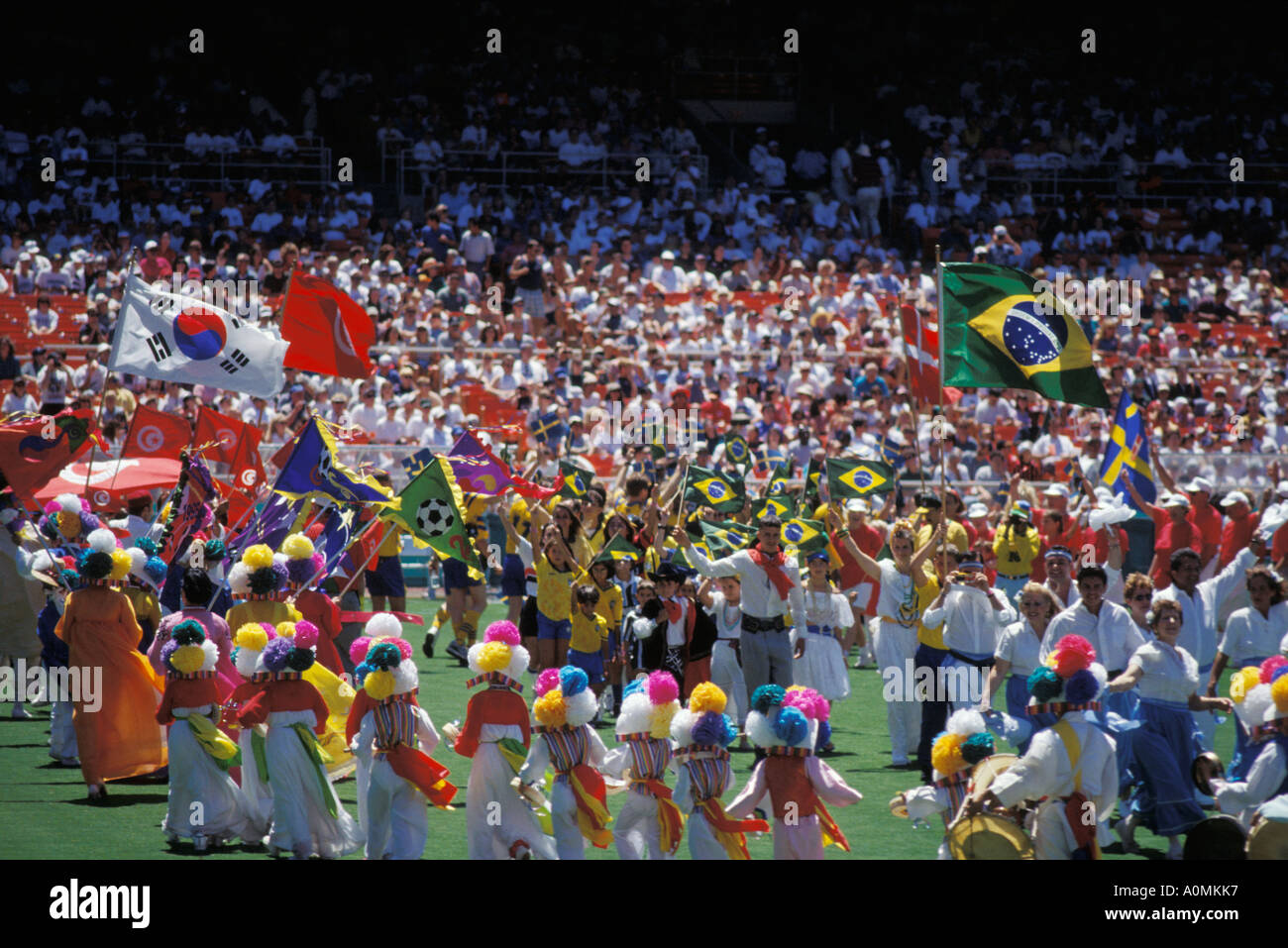 stadium display united nations multi ethnic groups flags half time show ...