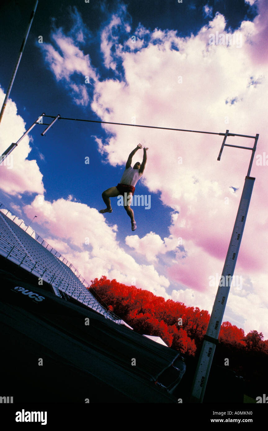 pole vaulter leaps over bar Stock Photo - Alamy