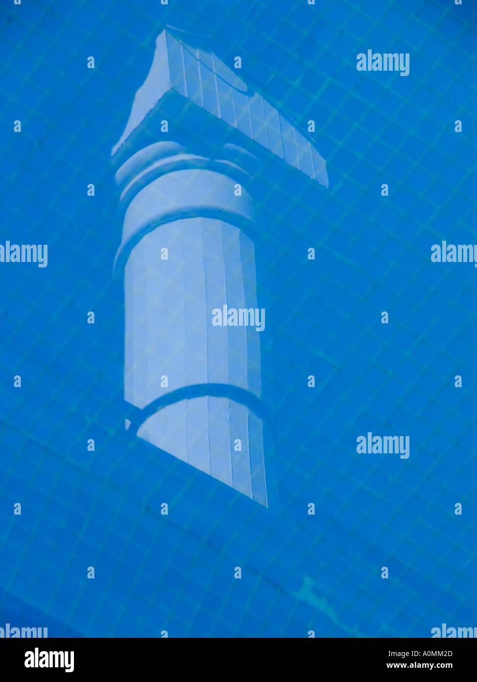 Column reflected in swimming pool Stock Photo - Alamy