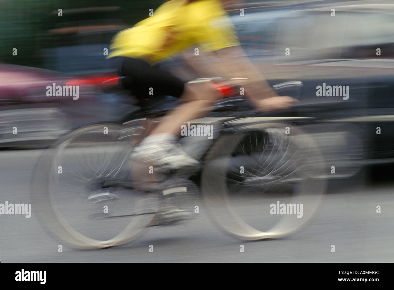 1 one man riding bicycle Stock Photo - Alamy