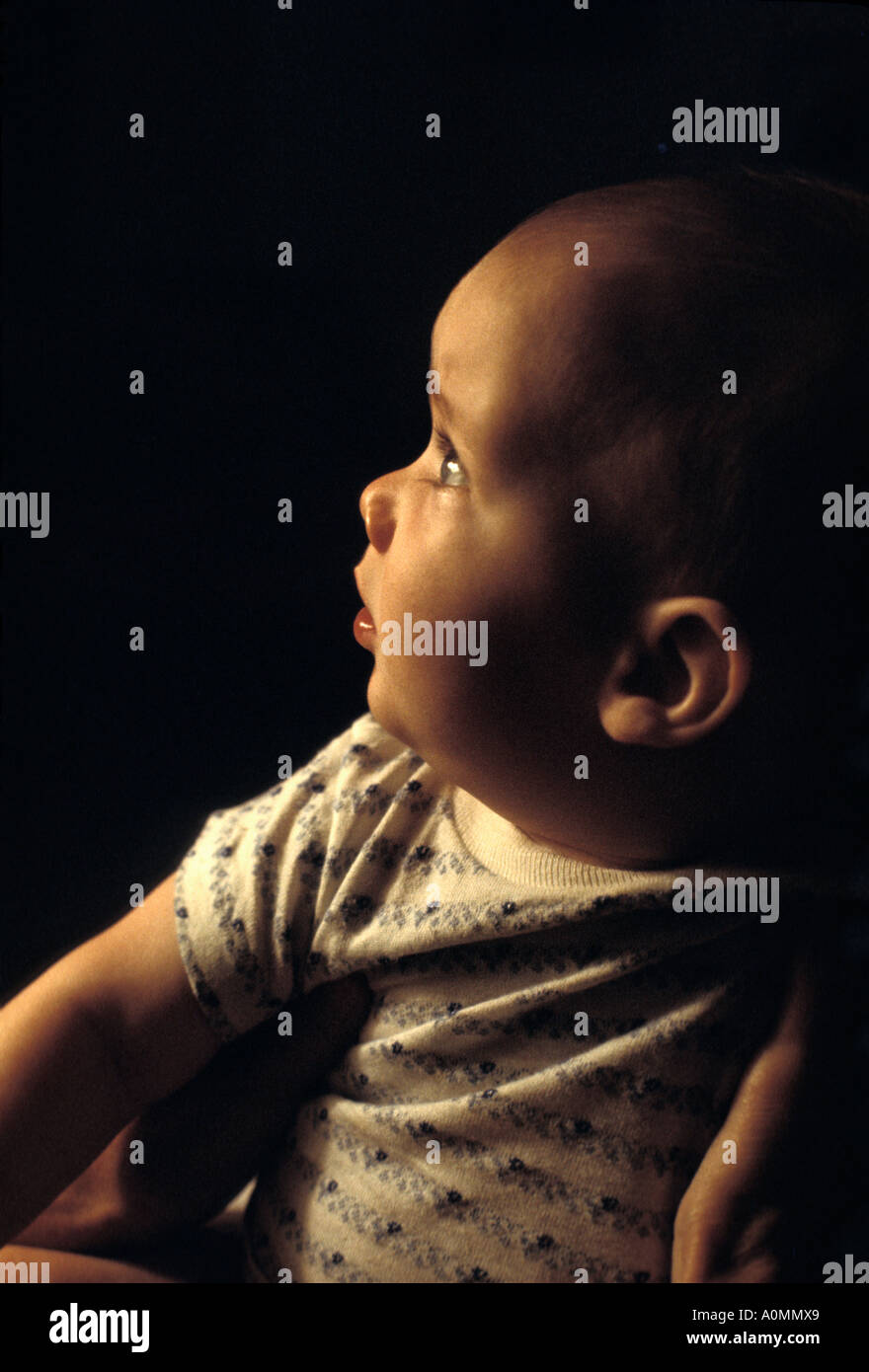 1 one young boy toddler stares upward Stock Photo - Alamy