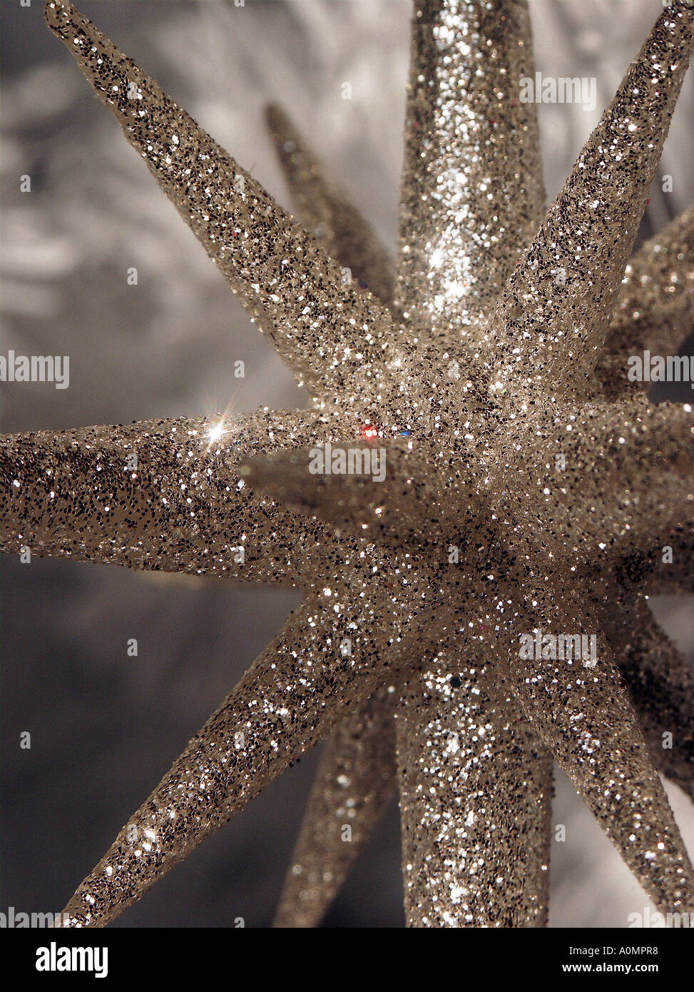 Gold christmas star decoration Stock Photo - Alamy