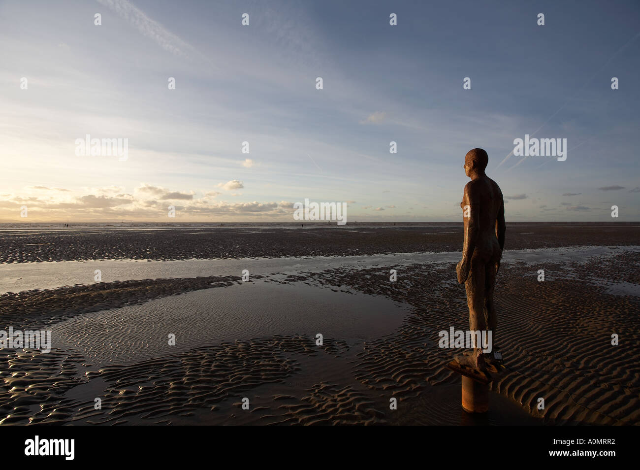 Antony Gormley Another Place Statue on Crosby Beach ,Merseyside Stock ...
