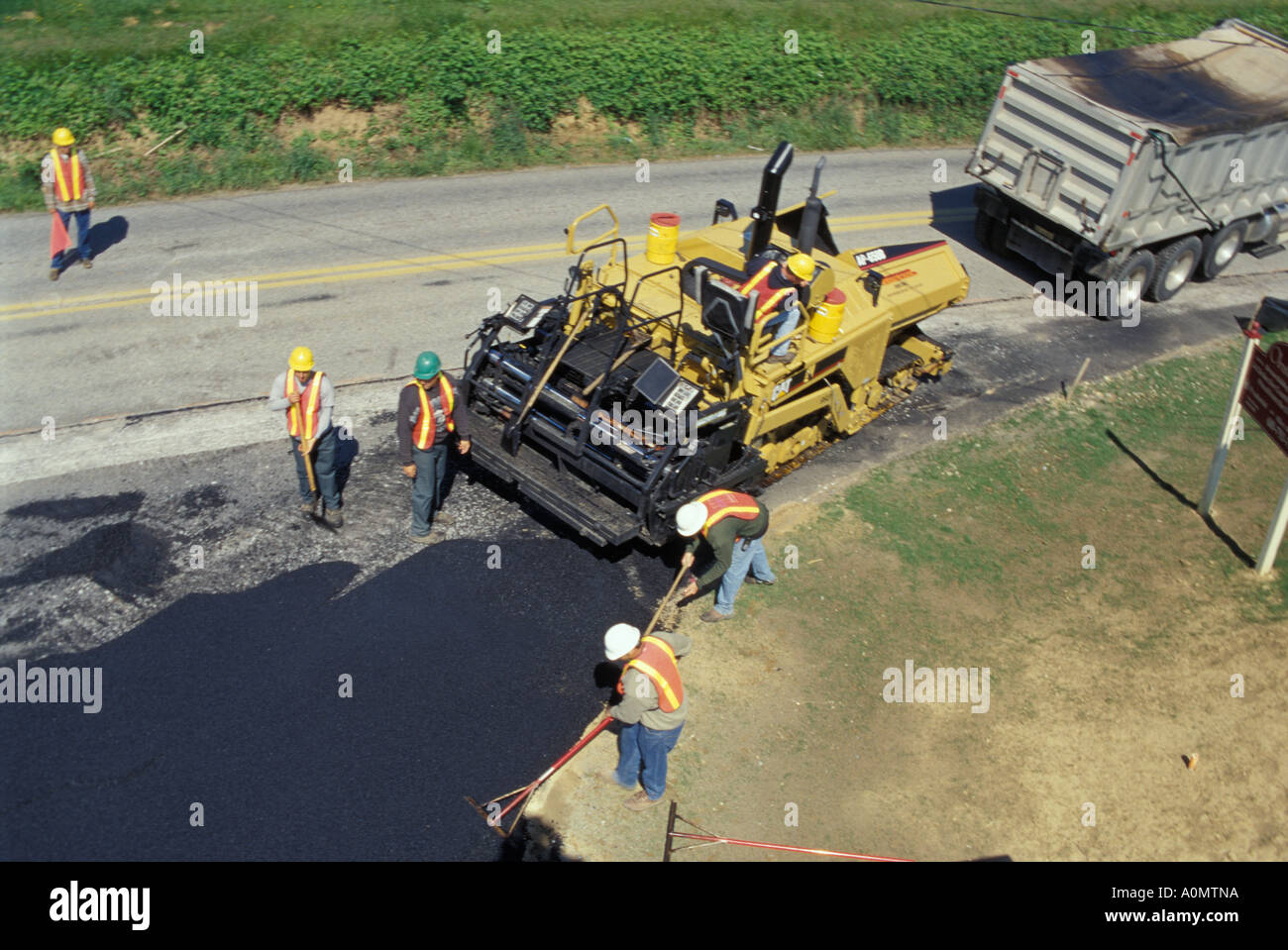 highway asphalt roller rolling levels smooths out street parking ...