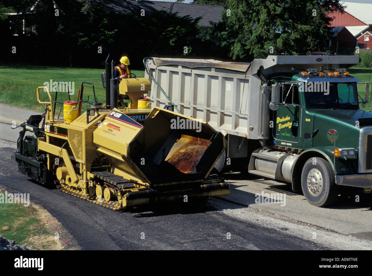 highway asphalt roller rolling levels smooths out street parking ...