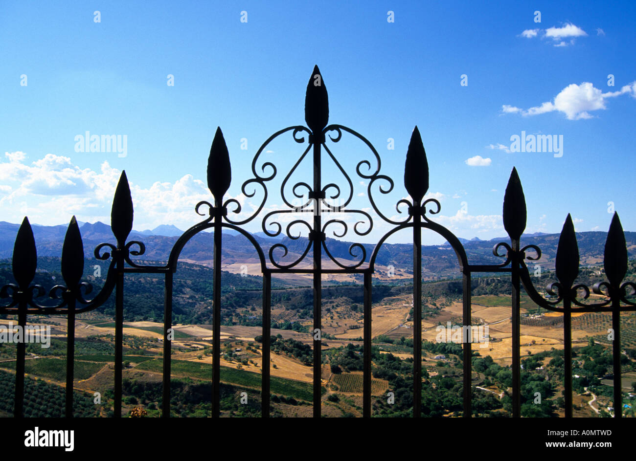 Spanish Landscape through Iron Railings Stock Photo - Alamy