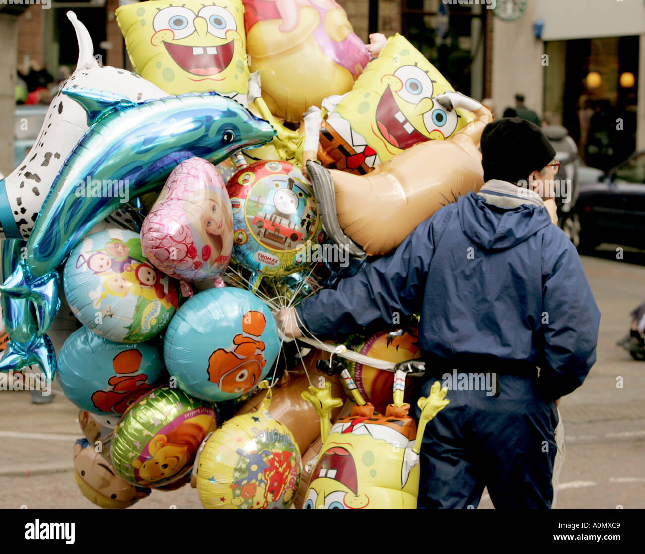 Man selling balloons helium childhood colorful cheerful celebration ...