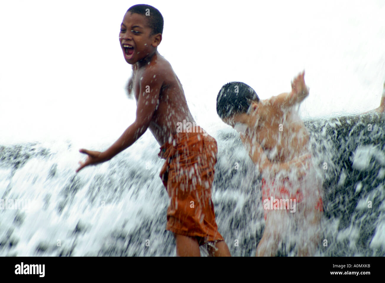 Boys on the malecon hi-res stock photography and images - Alamy