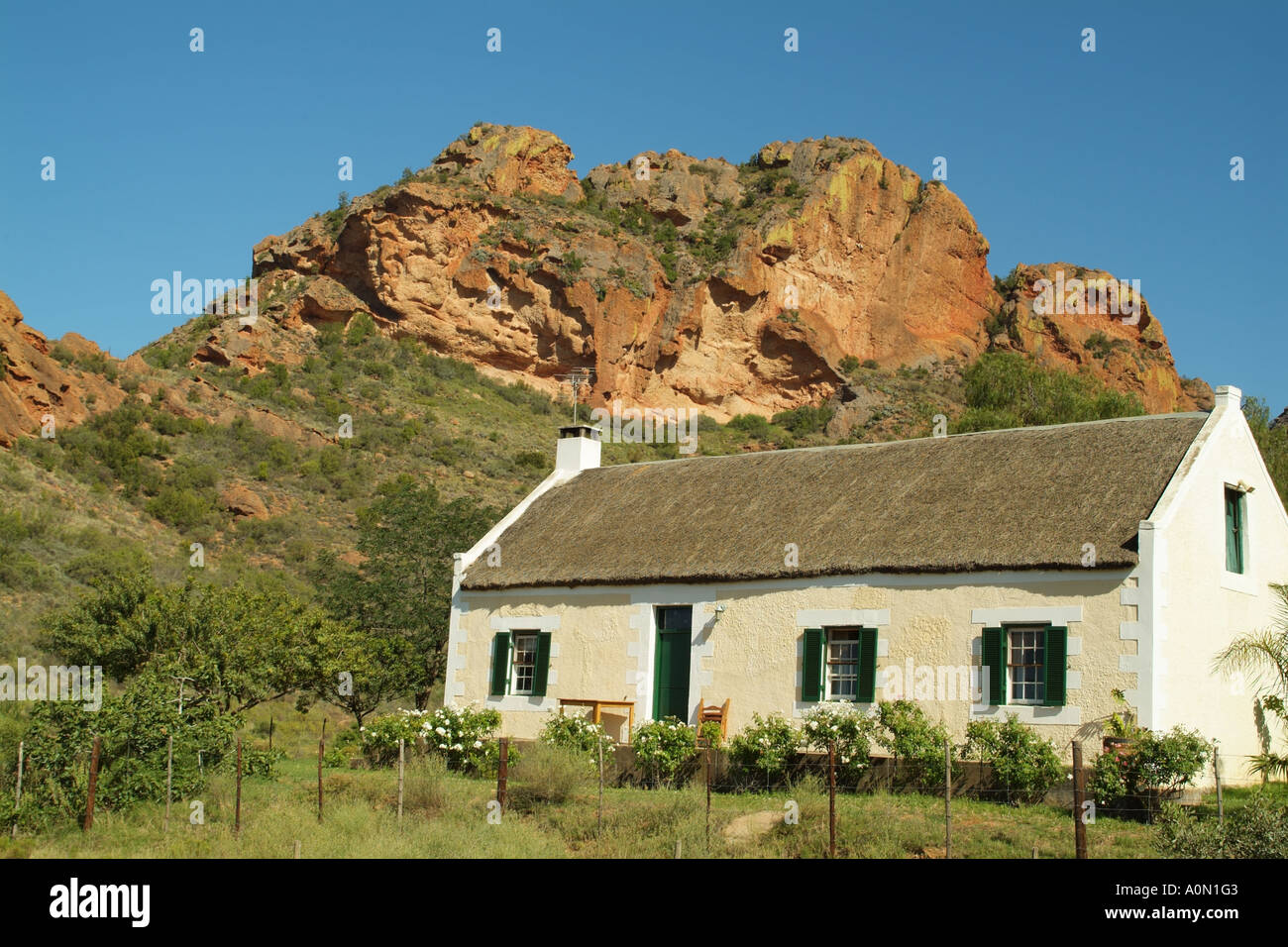 Traditional thatched farm cottage Red Stone Hills area of the Karoo ...