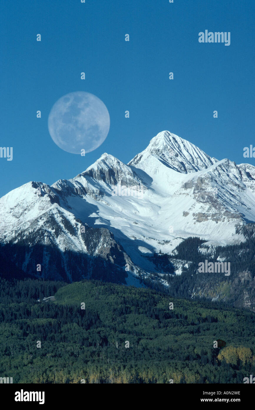 full moon over snow capped mountain Mount Wilson Uncompaghre National ...