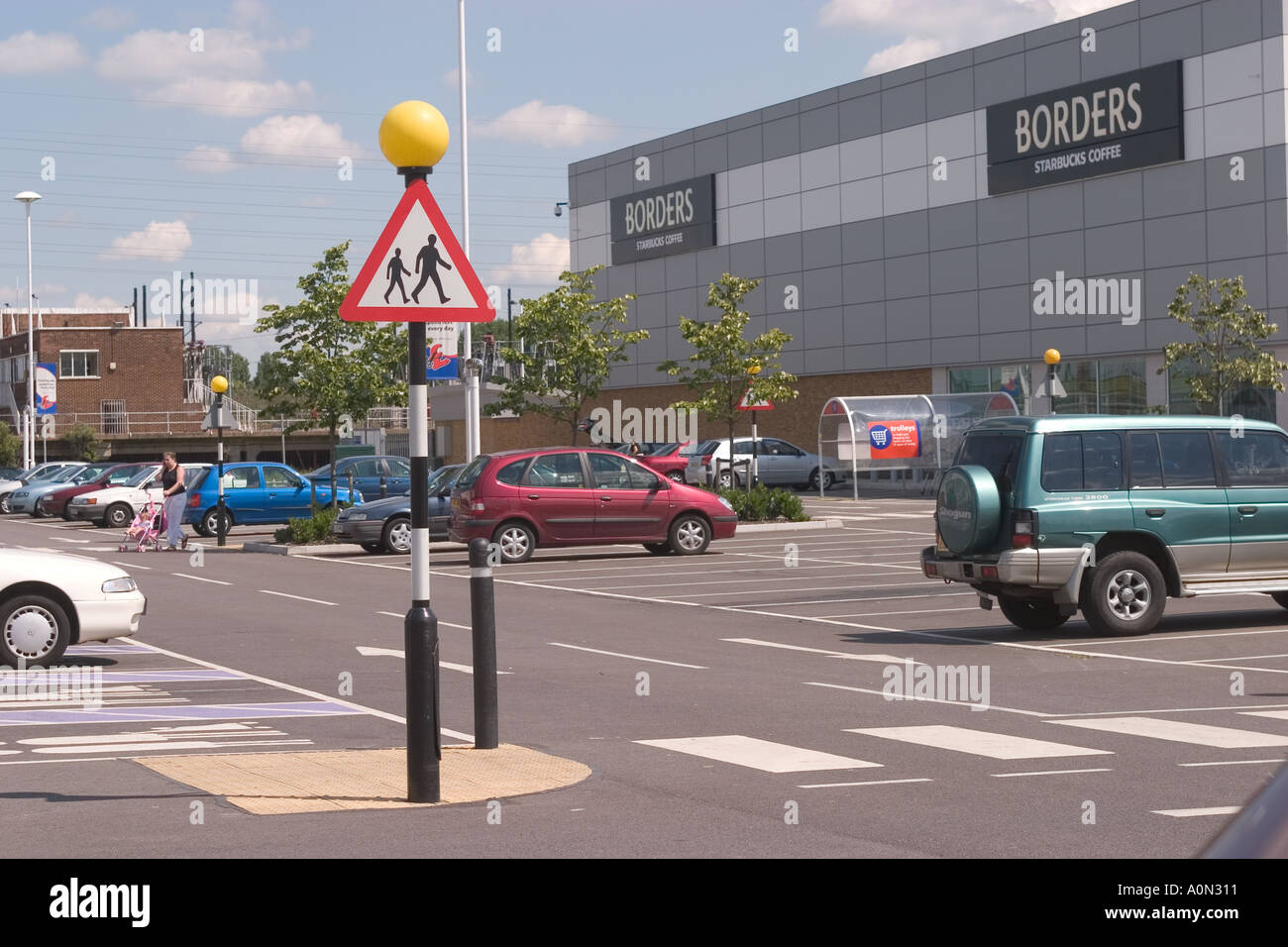 Belisha beacon and crossing sign at Gallions Reach Shopping Park ...