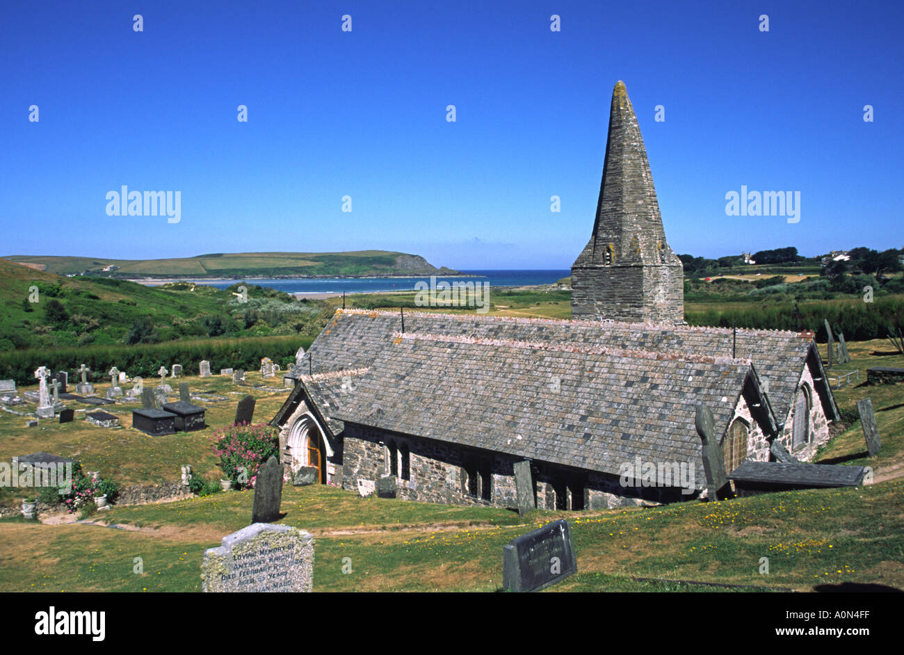 St Enodoc church with its crooked spire Trebetherick Cornwall England ...