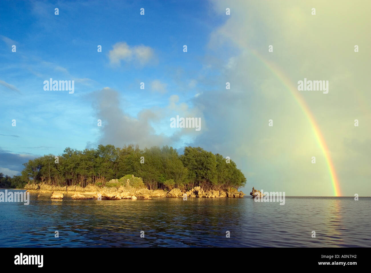 A rain storm approaches a small island in Palau, Micronesia Stock Photo ...