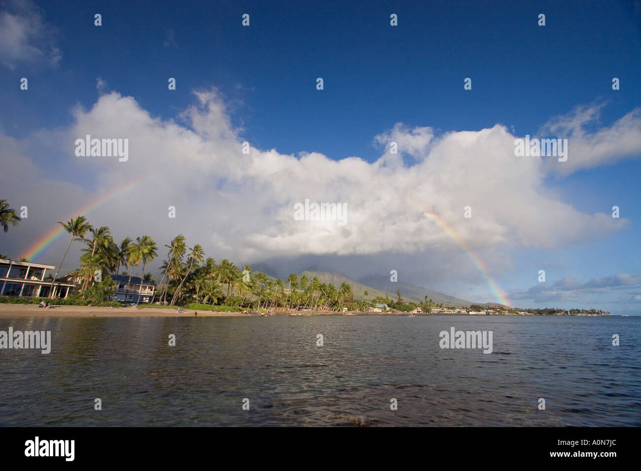 A rainbow over Kekei Beach, Lahaina and the West Maui Mountains, Hawaii ...