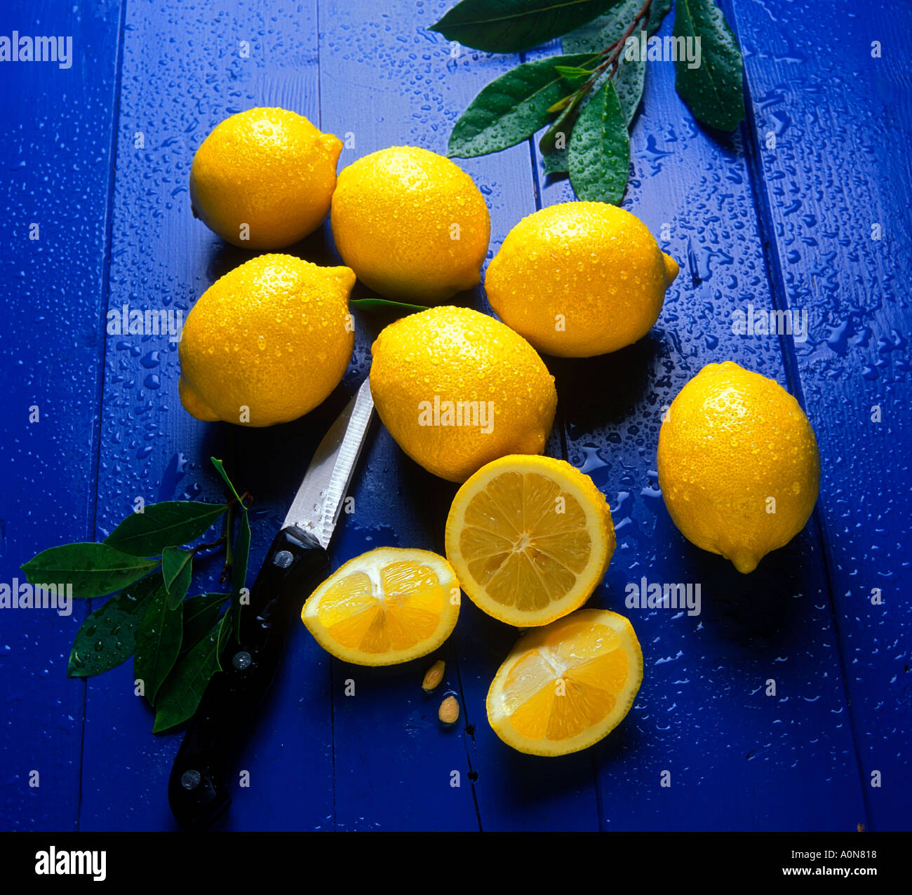 food fruit lemons on blue boards Stock Photo - Alamy