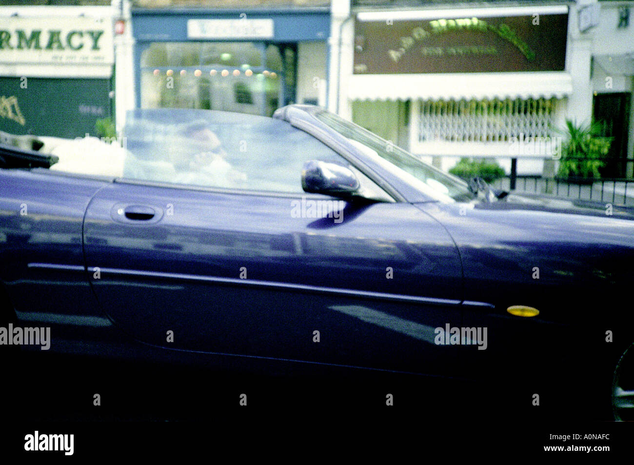 Smooth geezer in posh car Stock Photo - Alamy