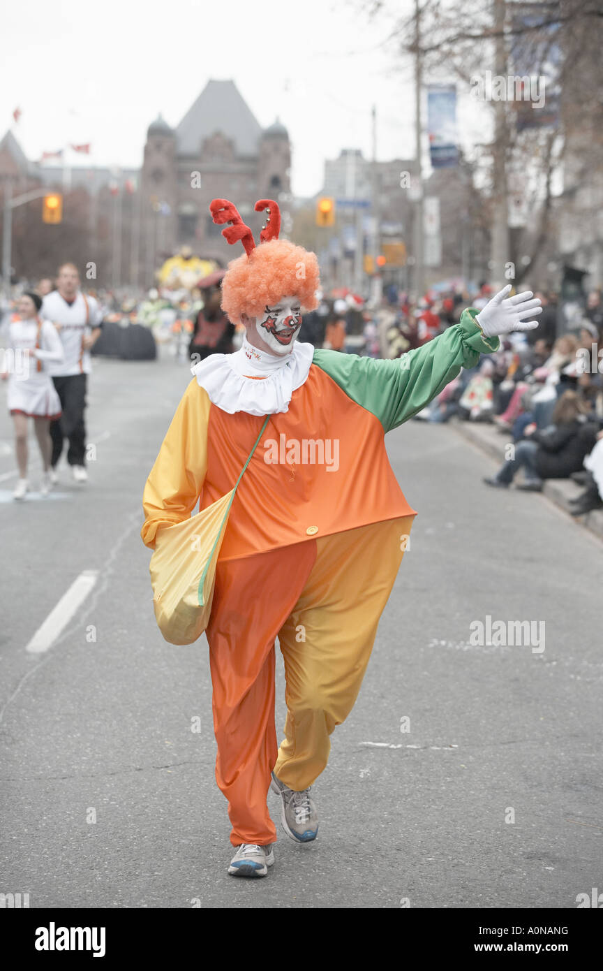 Clowns giving out candy at Santa Claus Parade, Toronto, Ontario, Canada ...