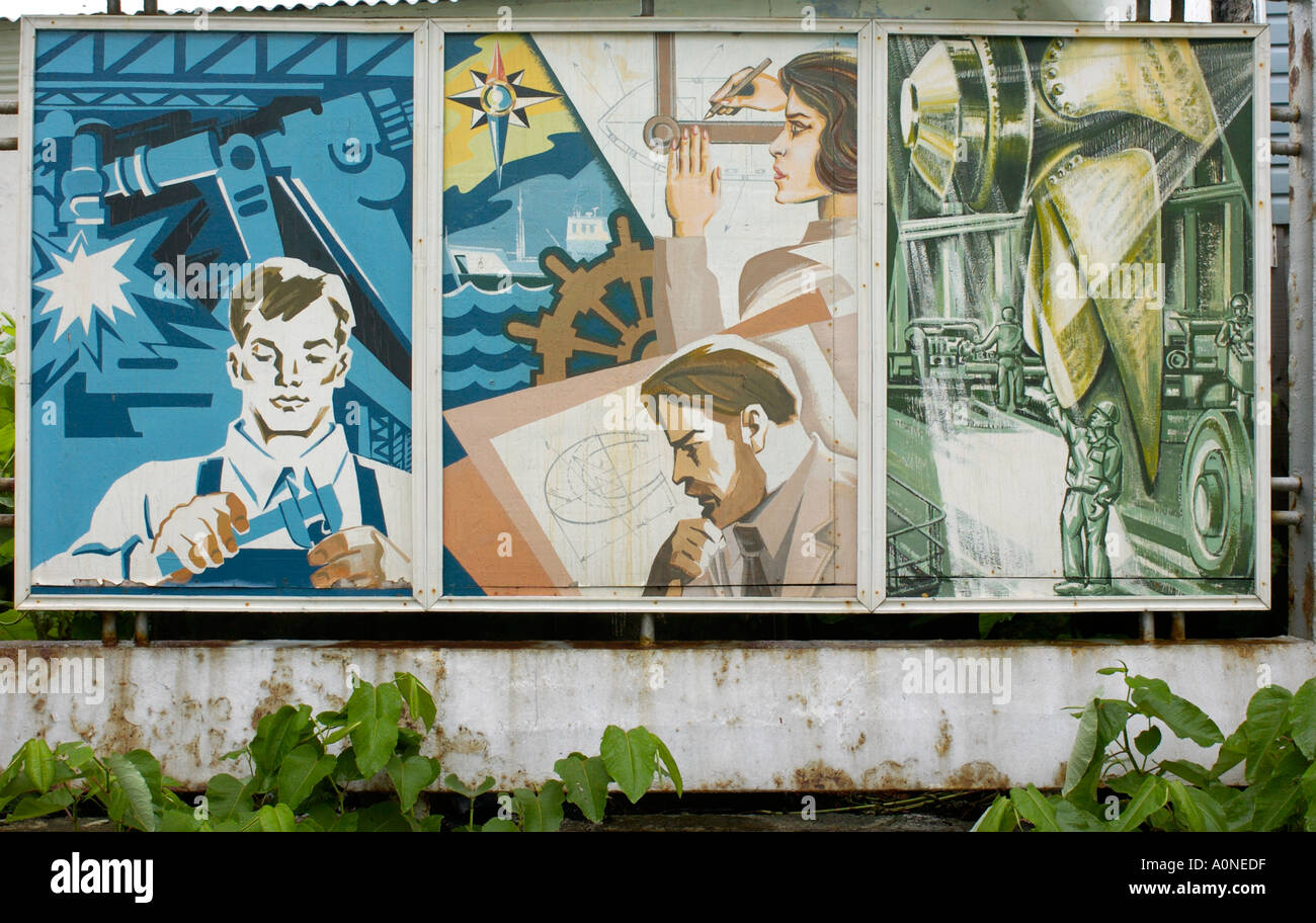 Soviet era murals painted on a wall outside a Nevelsk shipyard in ...