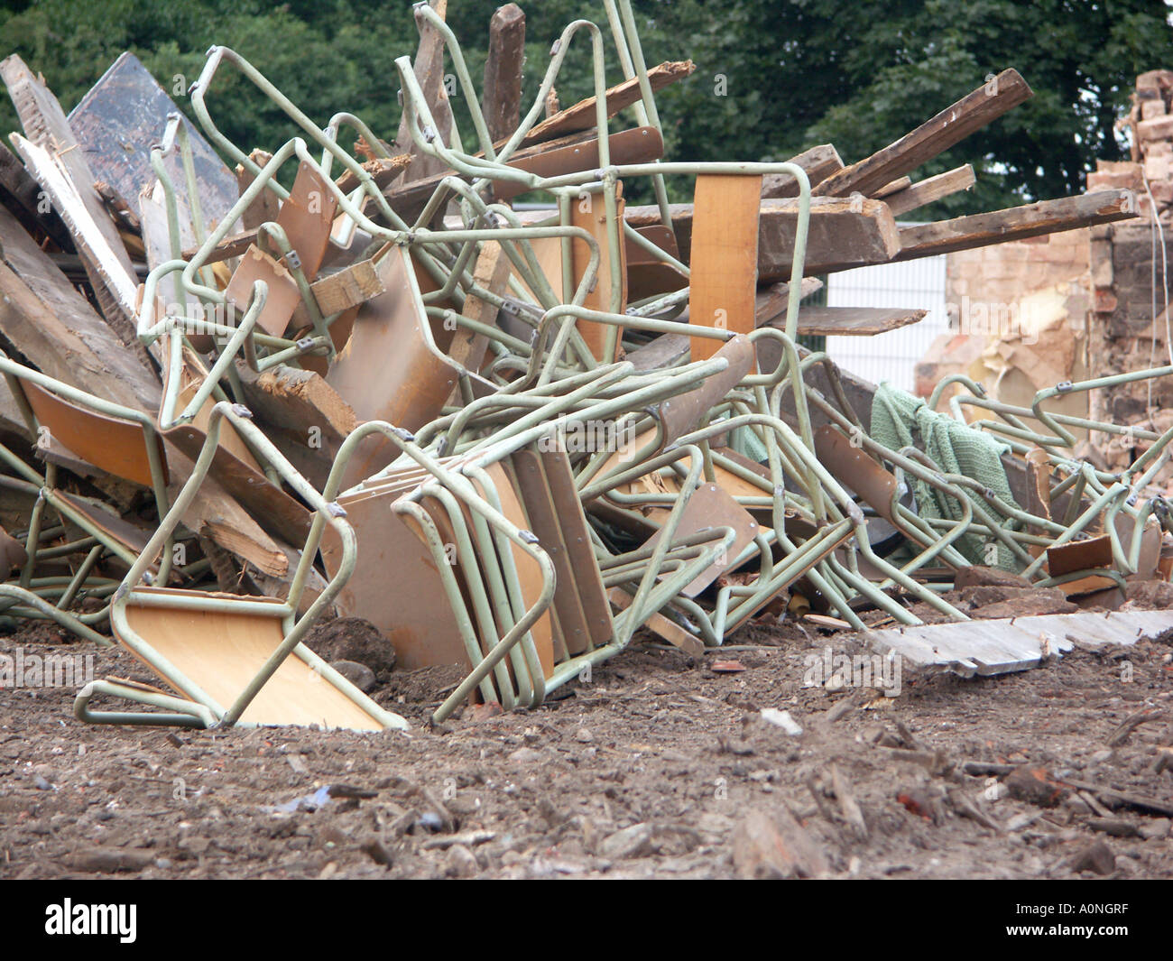Old stacking chairs on demolition site awaiting collection for ...