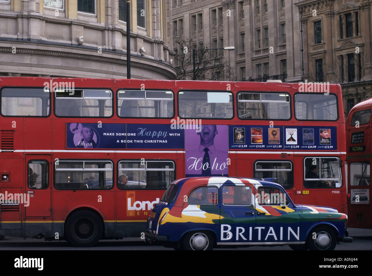 London, England, UK. Red London bus and black cab with the word ...