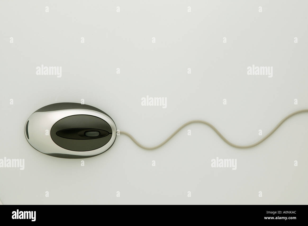Black and silver computer mouse on white background Stock Photo - Alamy