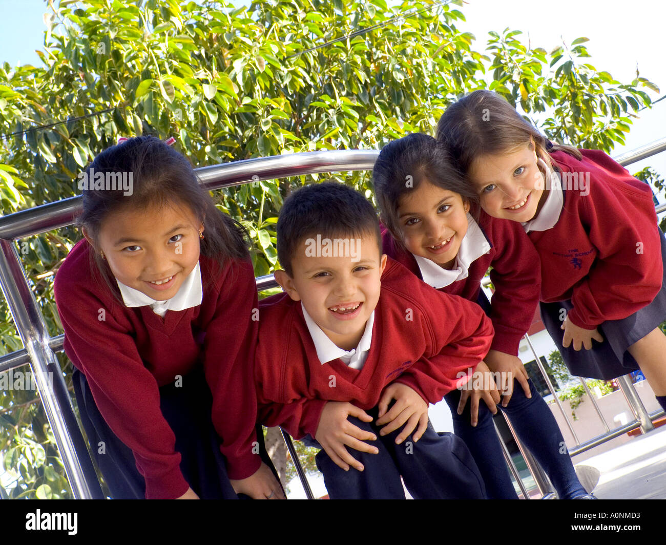 Junior School Pupils 5-9yrs Fun Happy group of young junior mixed race ...
