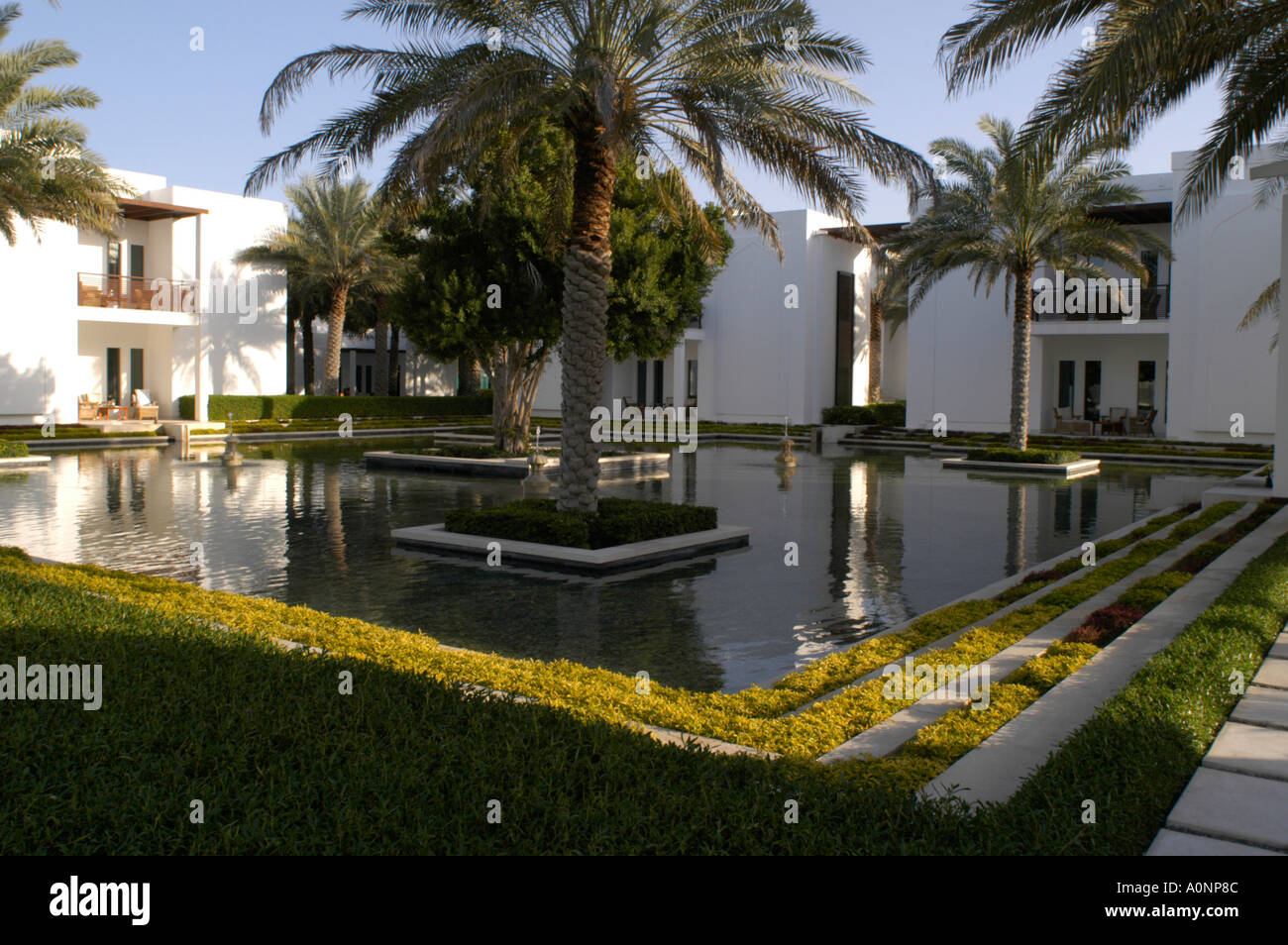 Oman, Muscat. The CHEDI Deluxe hotel. Bedrooms on two levels surround ...