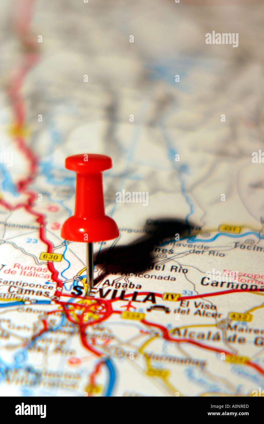 Map Pin pointing to Seville Spain on a road map Stock Photo - Alamy