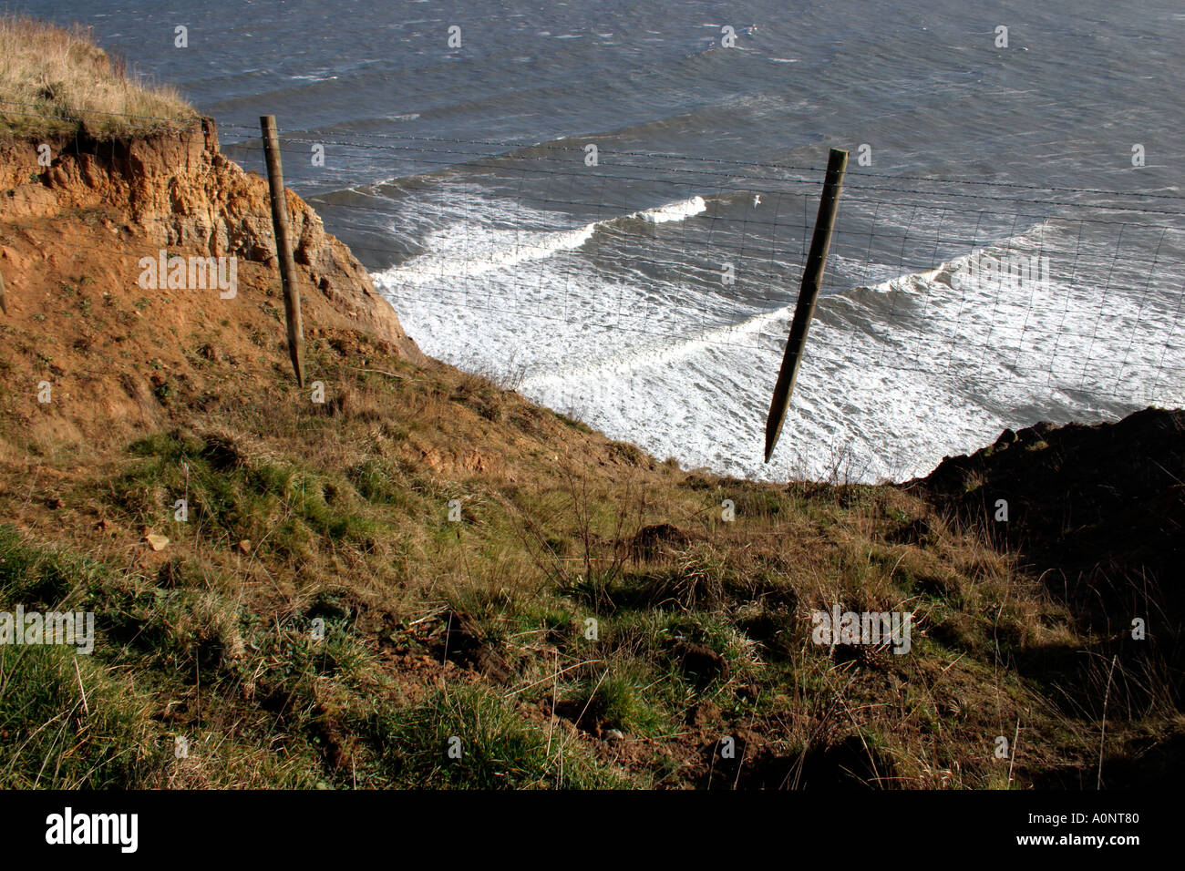 Cliff erosion Robin Hoods Bay North Yorkshire England Stock Photo - Alamy