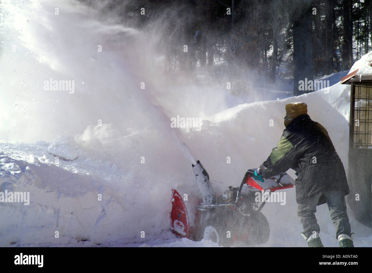 Man ploughing snow in ski hi-res stock photography and images - Alamy