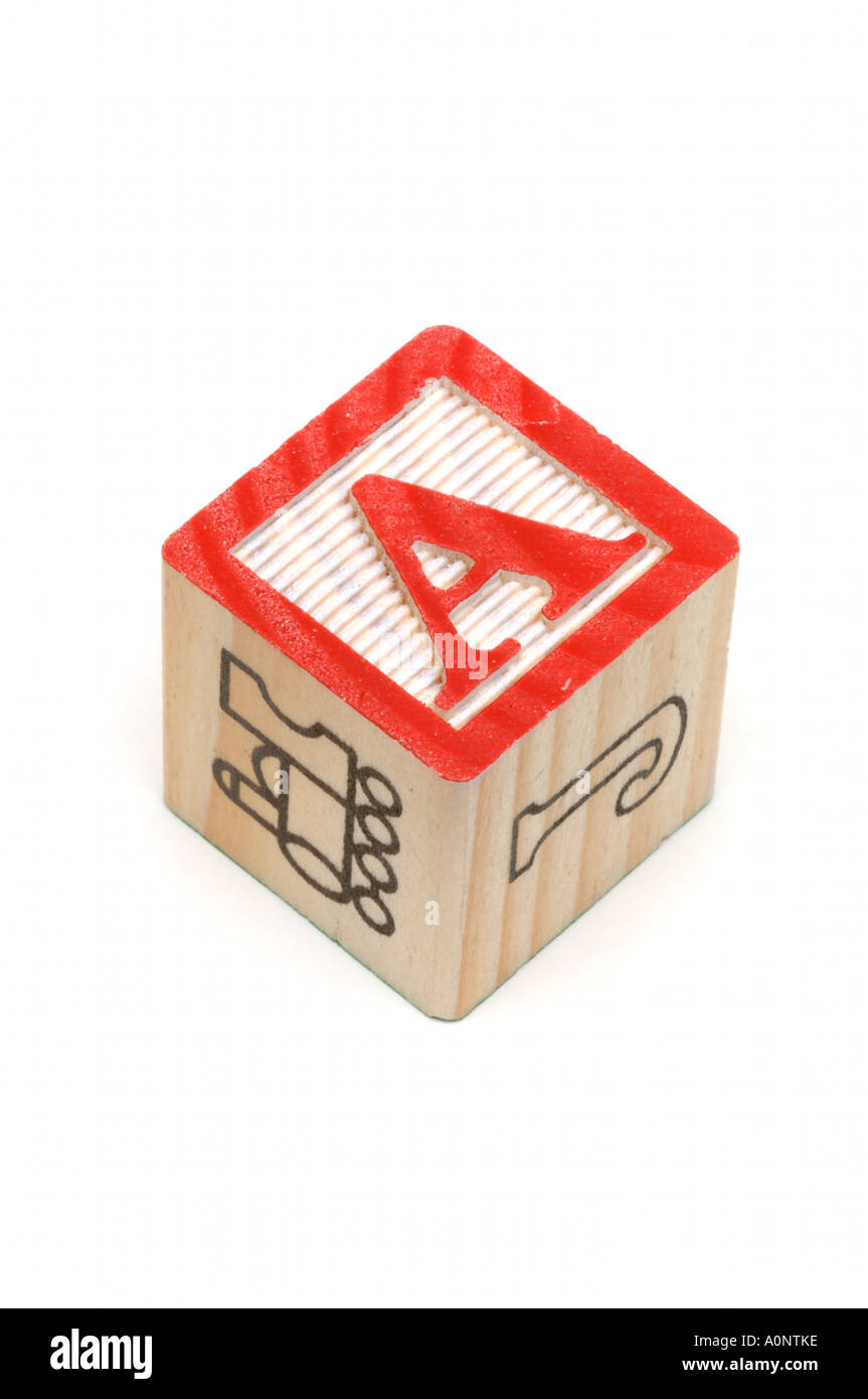 Children wooden learning block showing red alphabet A on white ...