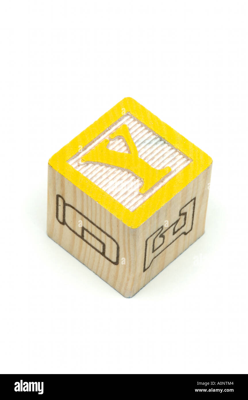 Children wooden learning block showing yellow alphabet Y on white ...