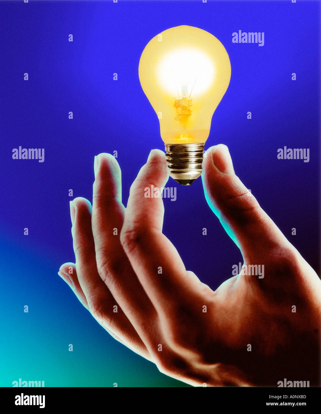 Hand Holding Light Bulb Stock Photo - Alamy