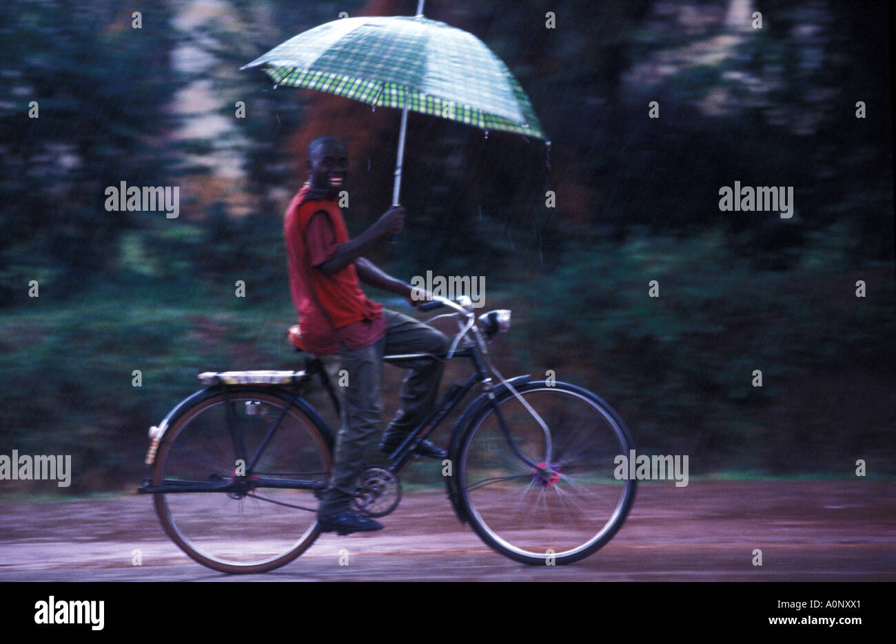African boy on bicycle hi-res stock photography and images - Alamy