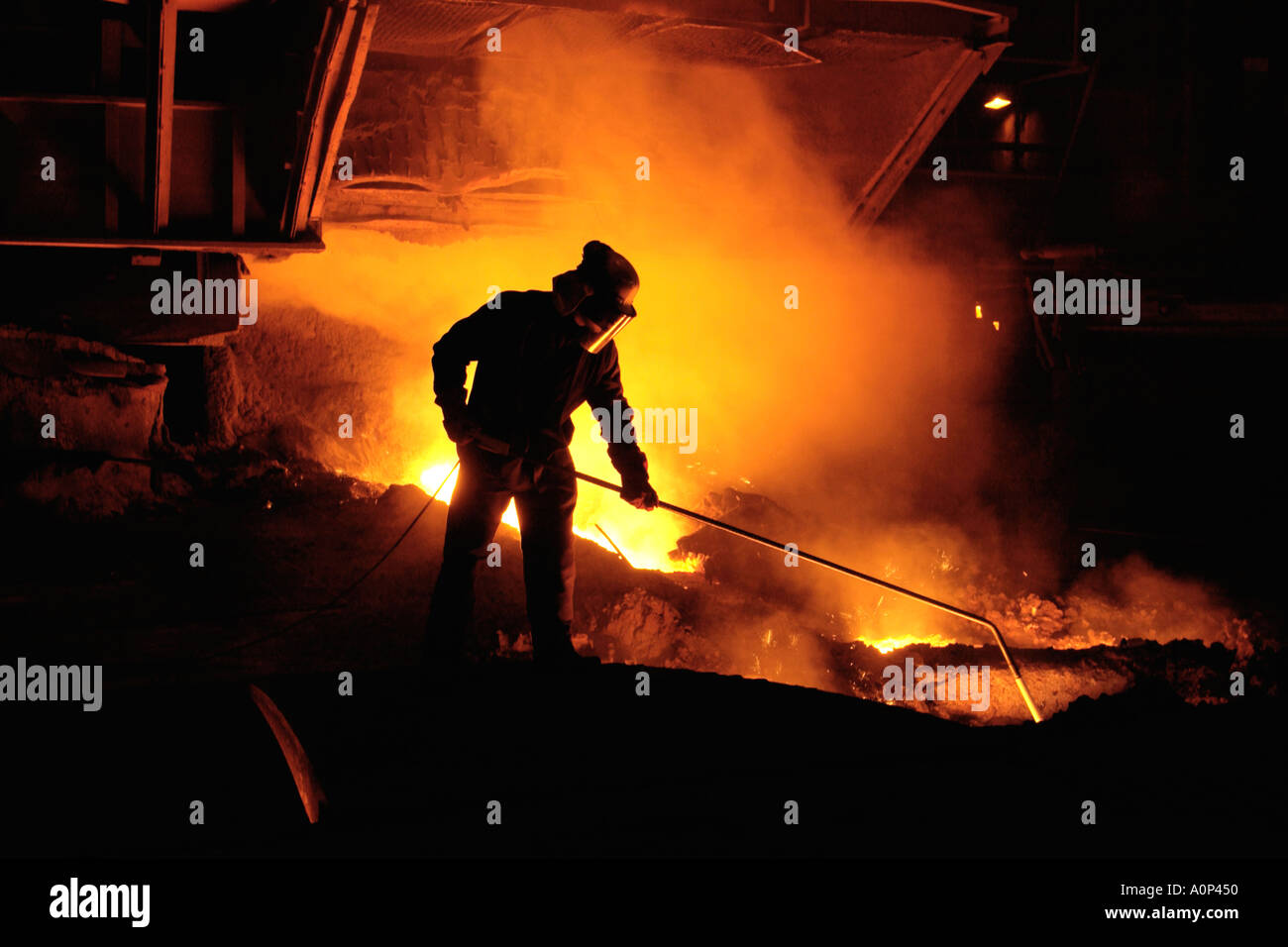 Team member taking iron samples using a lance on Blast Furnace No 5 at ...