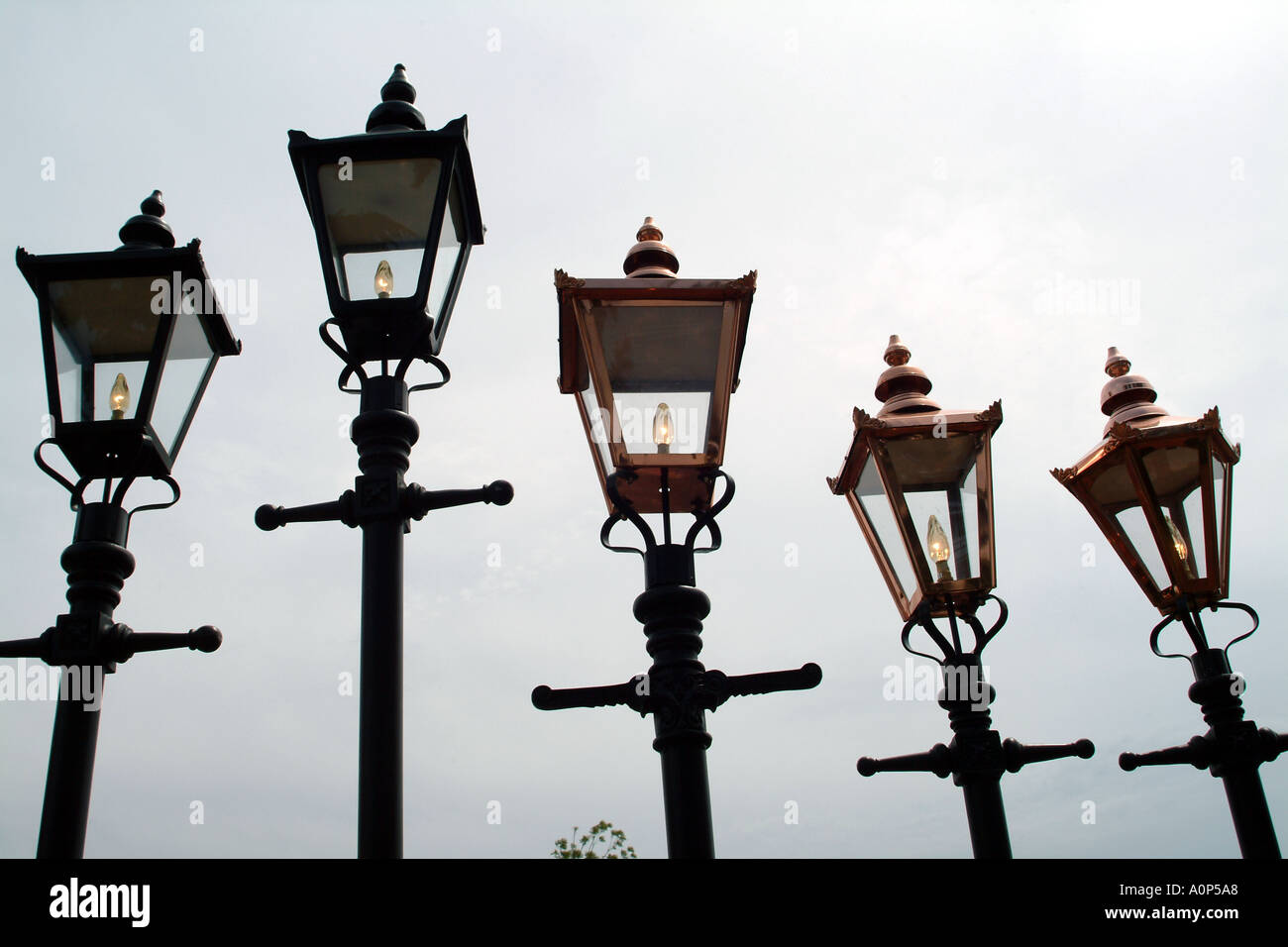 Line of five new lampposts Stock Photo - Alamy