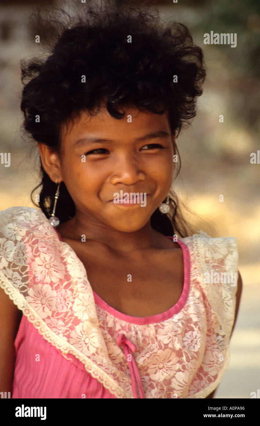 pretty cambodian girl in a pink dress at Angkor Wat in Cambodia Stock ...