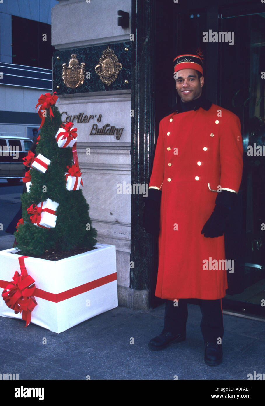 doorman in Christmas red coat at Cartier Jewelers 5th Avenue New York ...