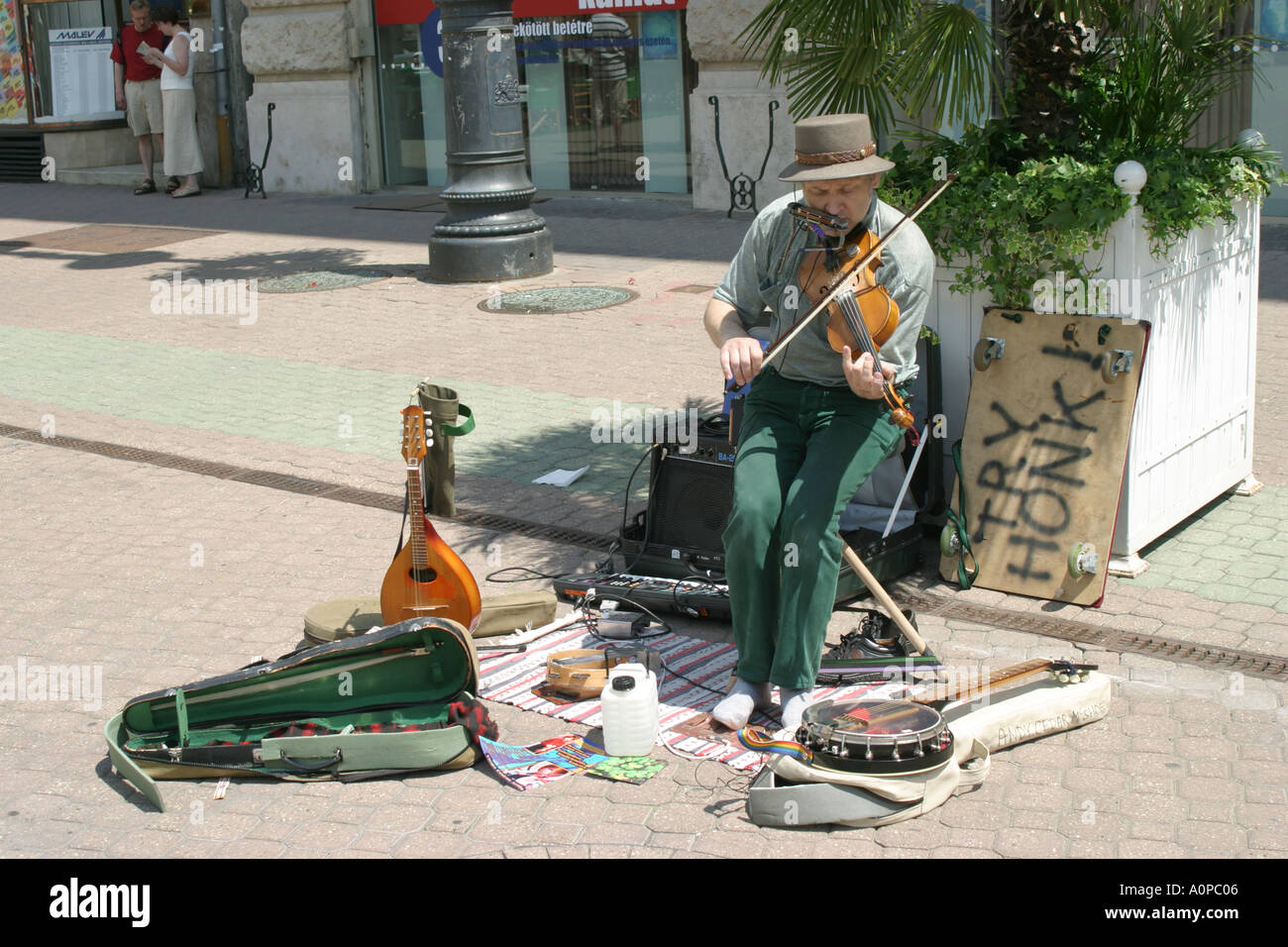 Street musician busking in Budapest Hungary Stock Photo - Alamy