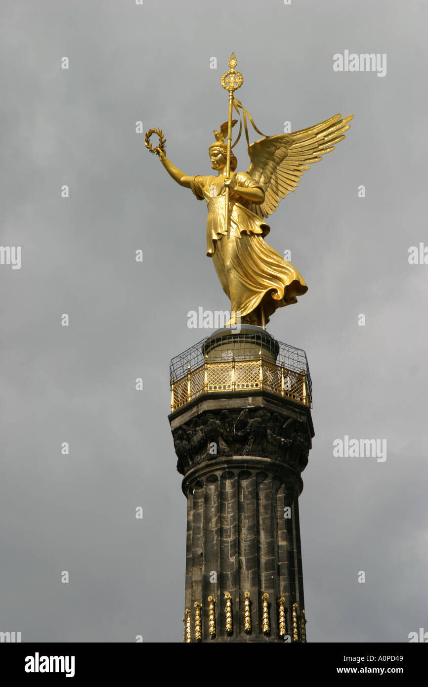 The gilded statue of Victory on the Siegessaule column in Berlin ...