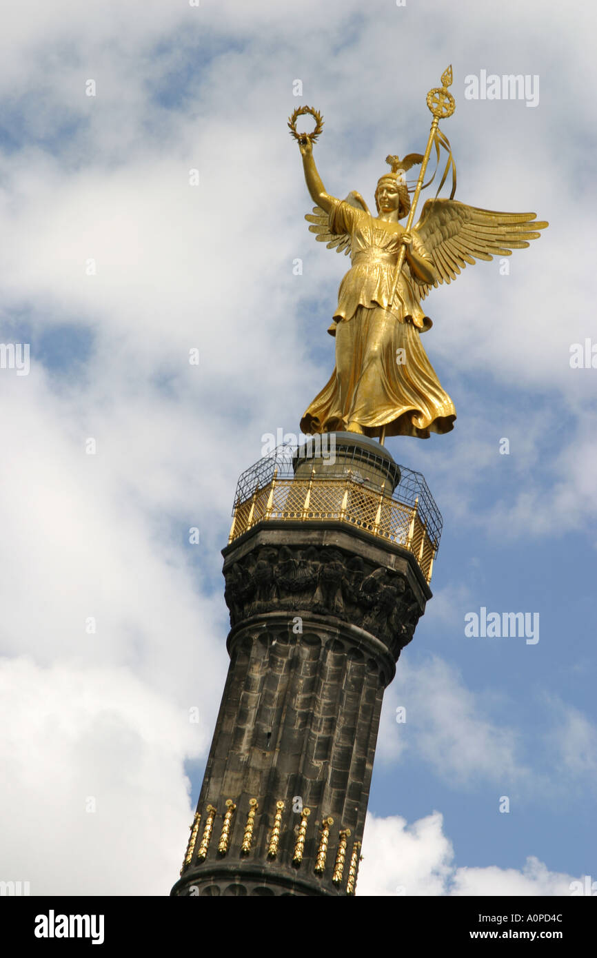 The gilded statue of Victory on the Siegessaule column in Berlin ...