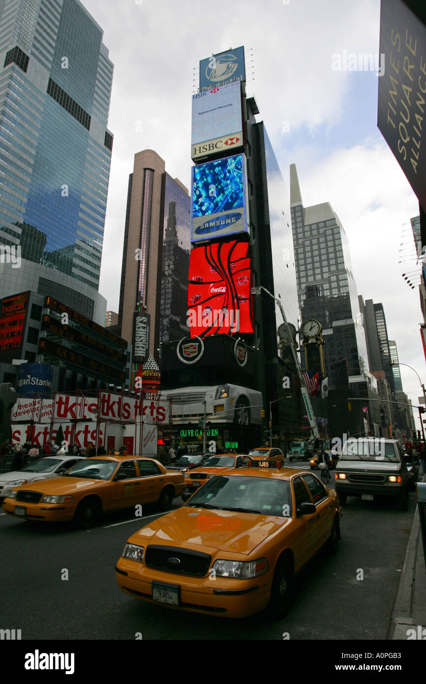 Bright Neon signs and iconic yellow taxi cabs taxis in famous ...